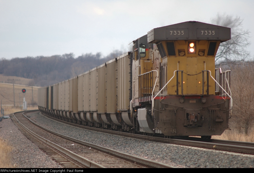 UP 7335, GE C4460AC, a lone convertible works as a DPU remote unit shoving on the WEPX empties